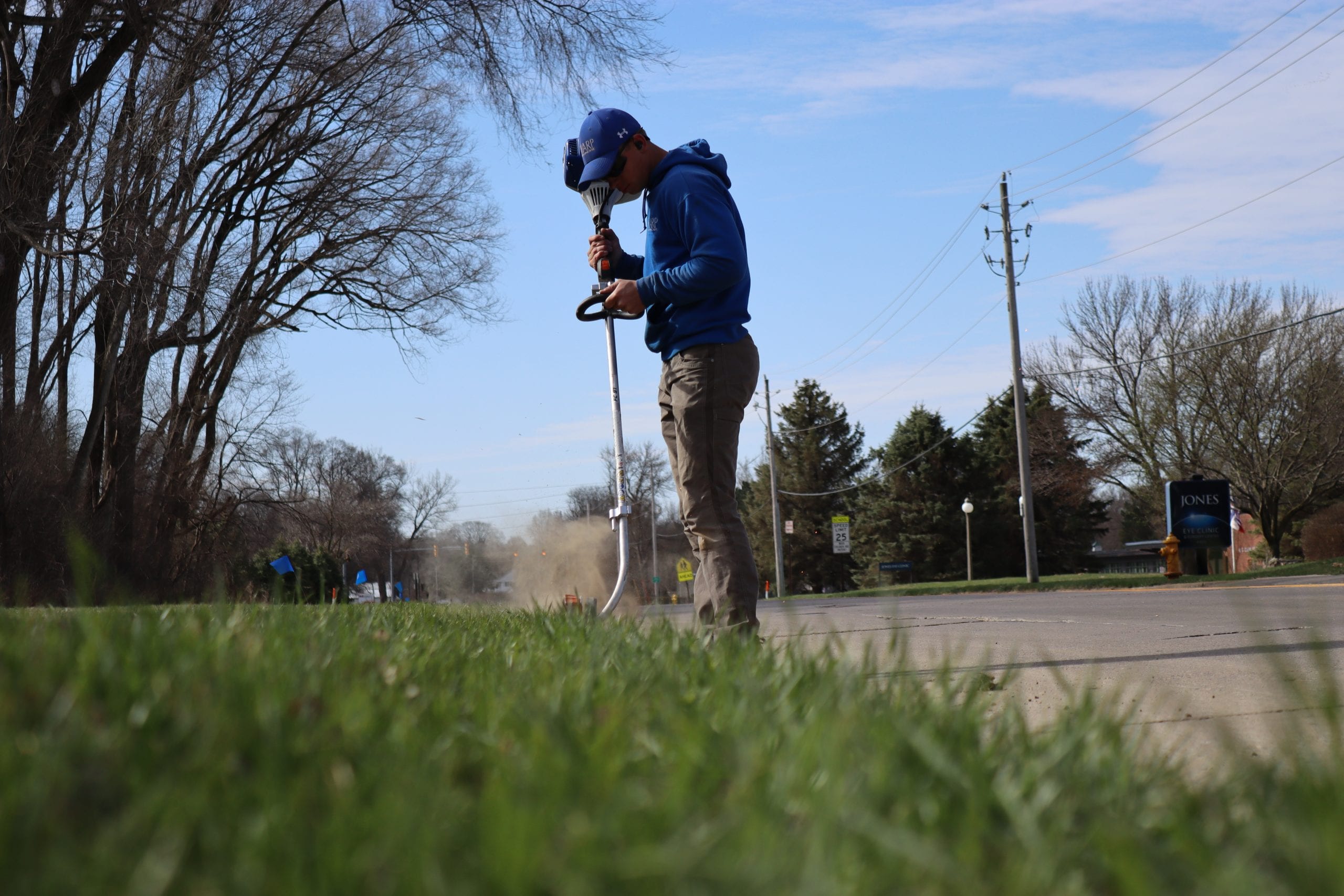 Why Hire a Professional Lawn Care Company? | Sharp Lawn Care Blog